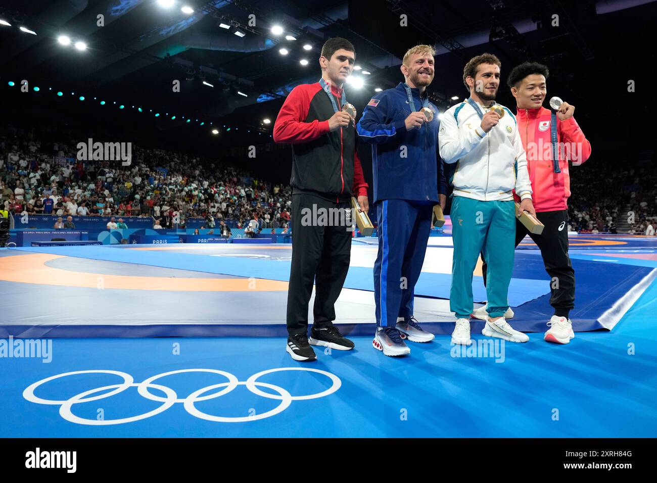 Medalists, from left, Albania's Chermen Valiev, bronze, Kyle Douglas ...