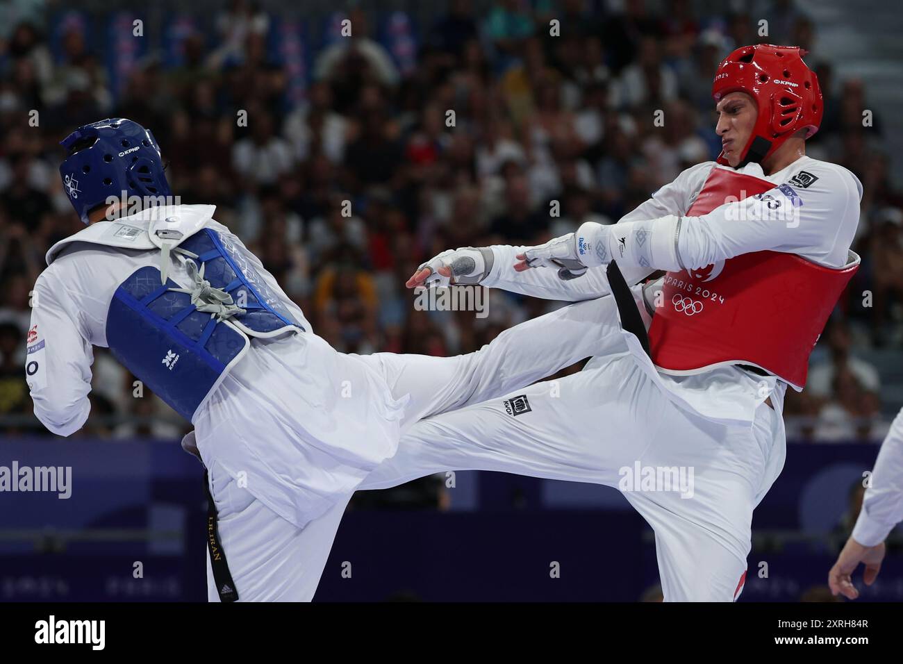 Paris, France. 10th Aug, 2024. Arian Salimi (in blue) of Iran competes ...
