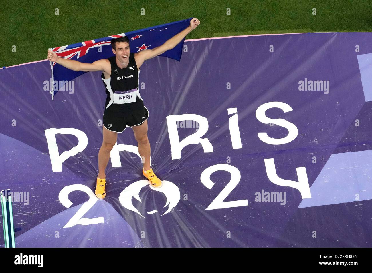 Hamish Kerr, of New Zealand, celebrates after winning the men's high ...
