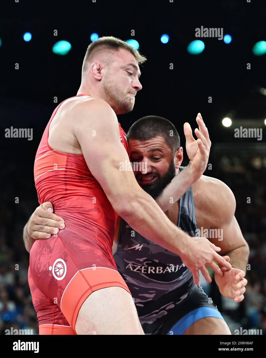 Paris, France. 10th Aug, 2024. Giorgi Meshvildishvili (in blue) of ...