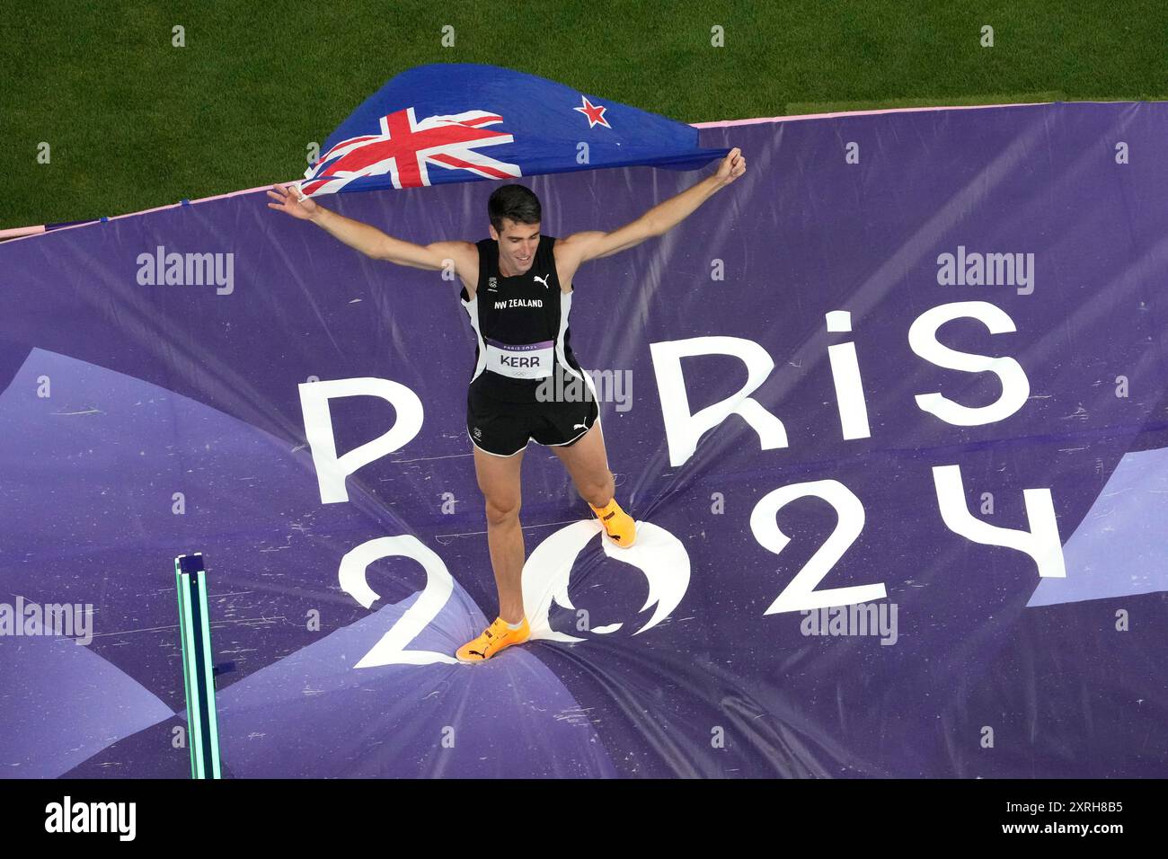 Hamish Kerr, of New Zealand, celebrates after winning the men's high ...