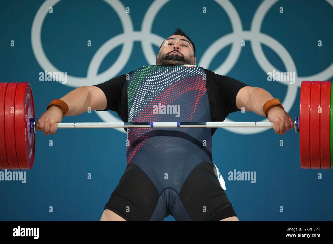 Ali Davaoudi of Iran competes during the men's +102kg weightlifting ...