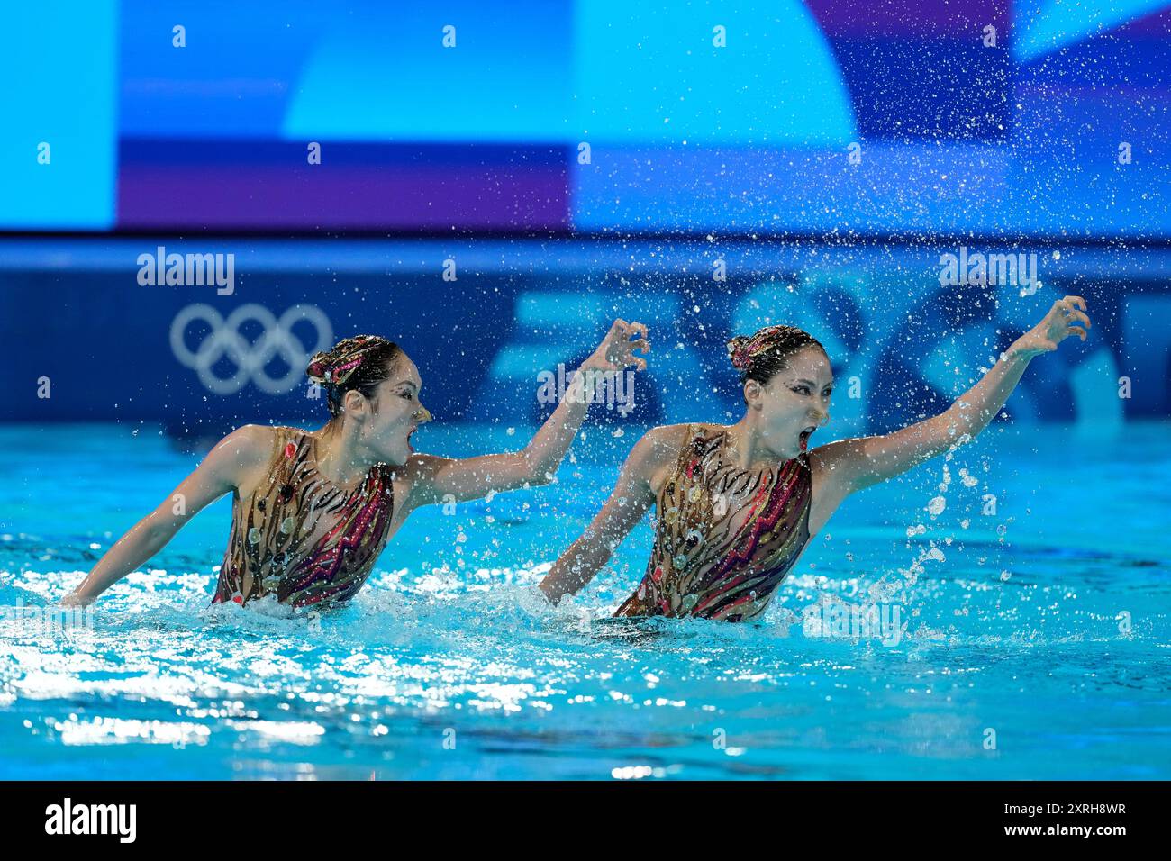 China's Wang Liuyi and Wang Qianyi, compete in the duet free routine of ...