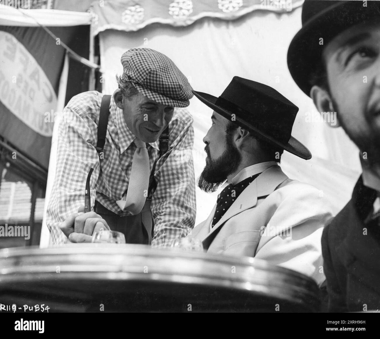 JOHN HUSTON talking to CHRISTOPHER LEE in costume for his role as ...