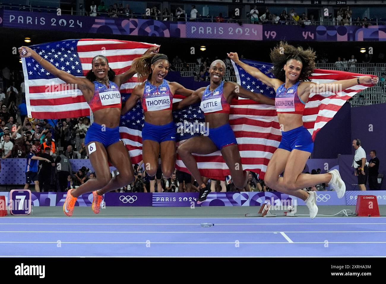 The United States' women 4x400-meter relay team celebrates winning the ...