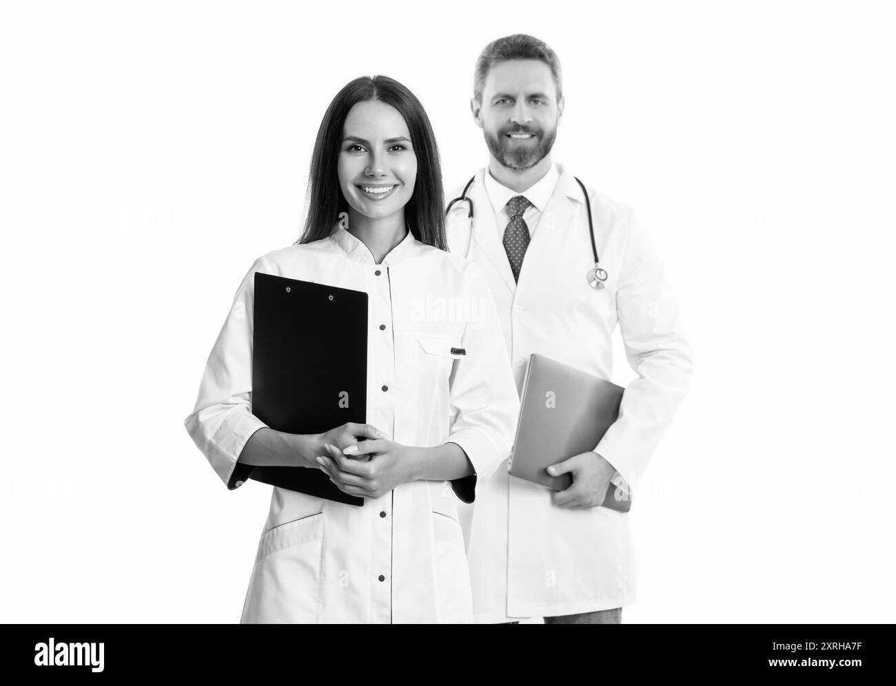 selective focus of doctor and internist isolated on white background ...