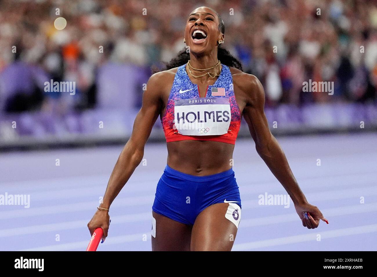 Alexis Holmes, of the United States, reacts after winning the women's ...