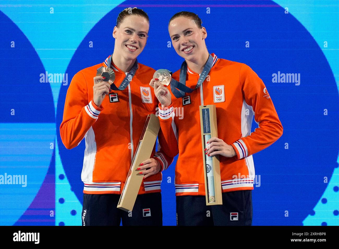 Netherlands' Bregje de Brouwer and Noortje de Brouwer show their bronze ...