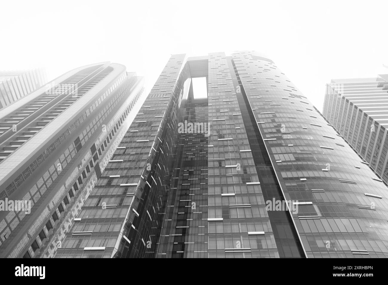 skyscraper building with glass facade architecture in perspective ...