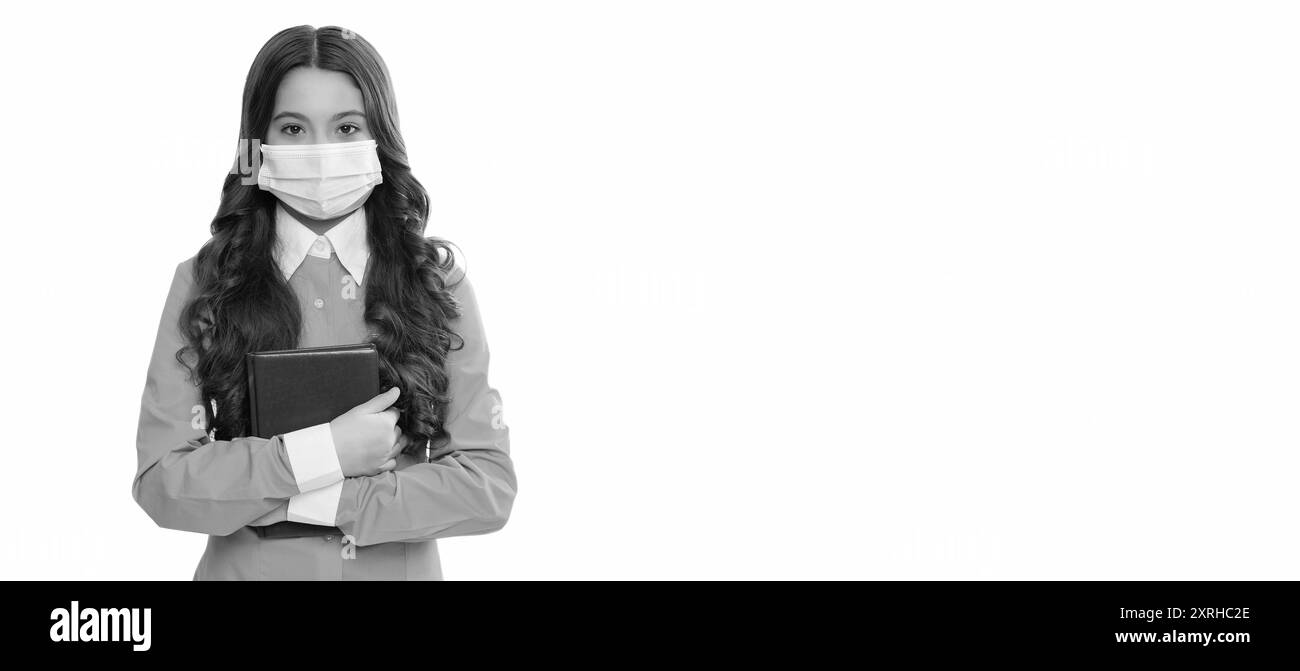 school girl in mask read book on quarantine isolated on white. school ...