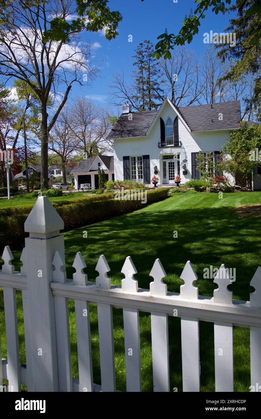 Front-yard garden with white picket fence Stock Photo - Alamy