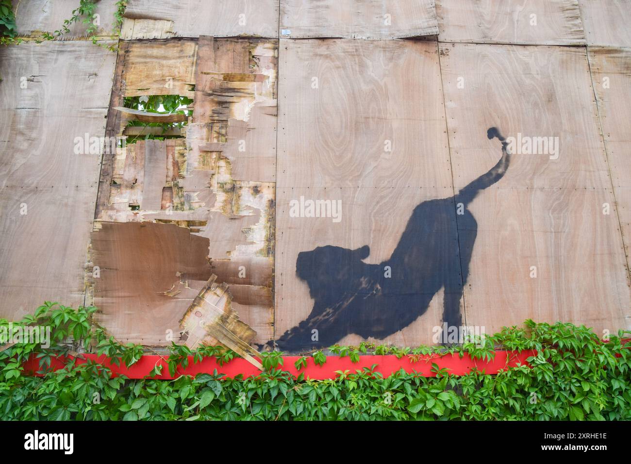 A new artwork by Banksy appears on an old billboard in Cricklewood. The ...