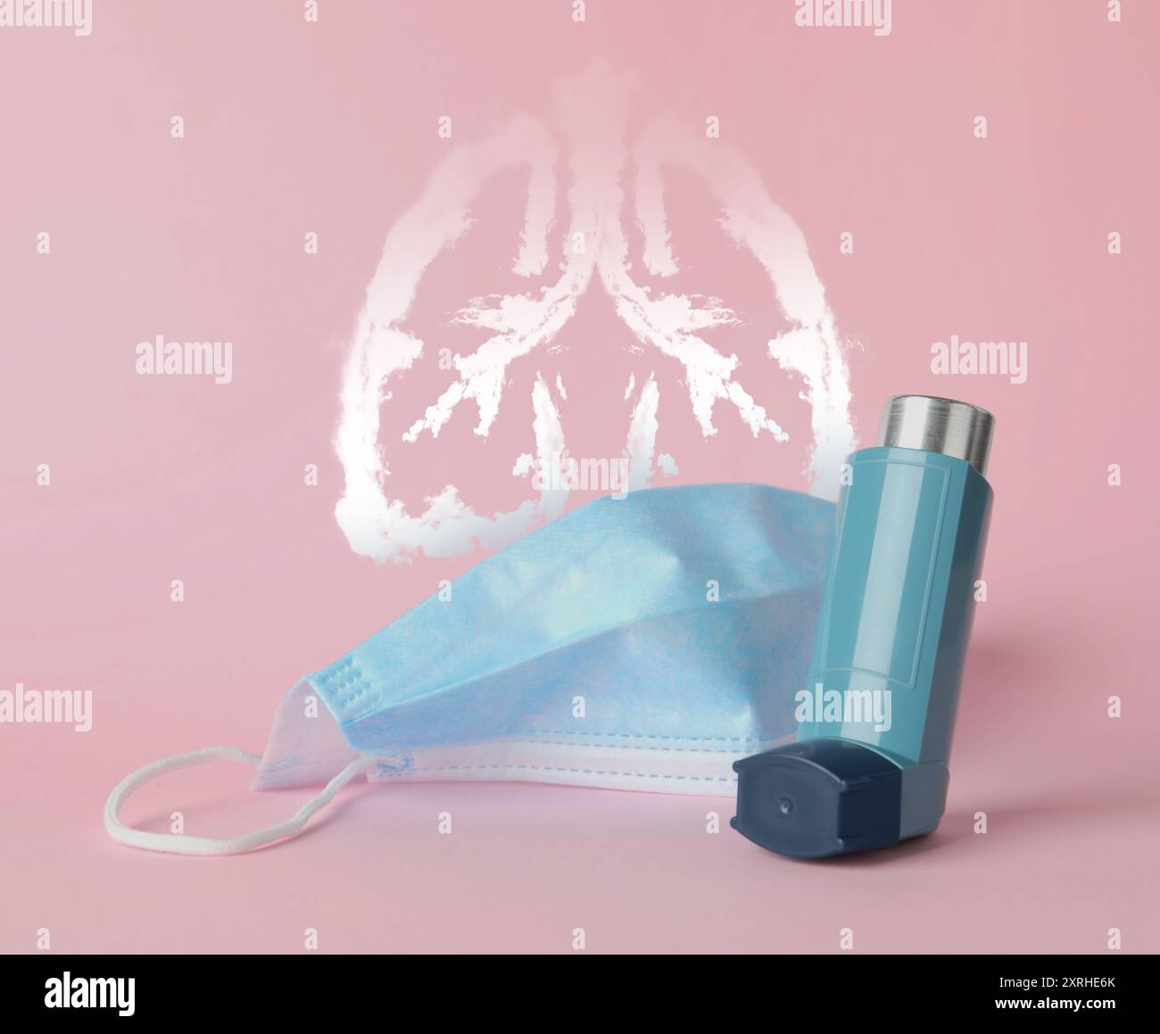 Asthma inhaler, medical mask and illustration of lungs on pink ...