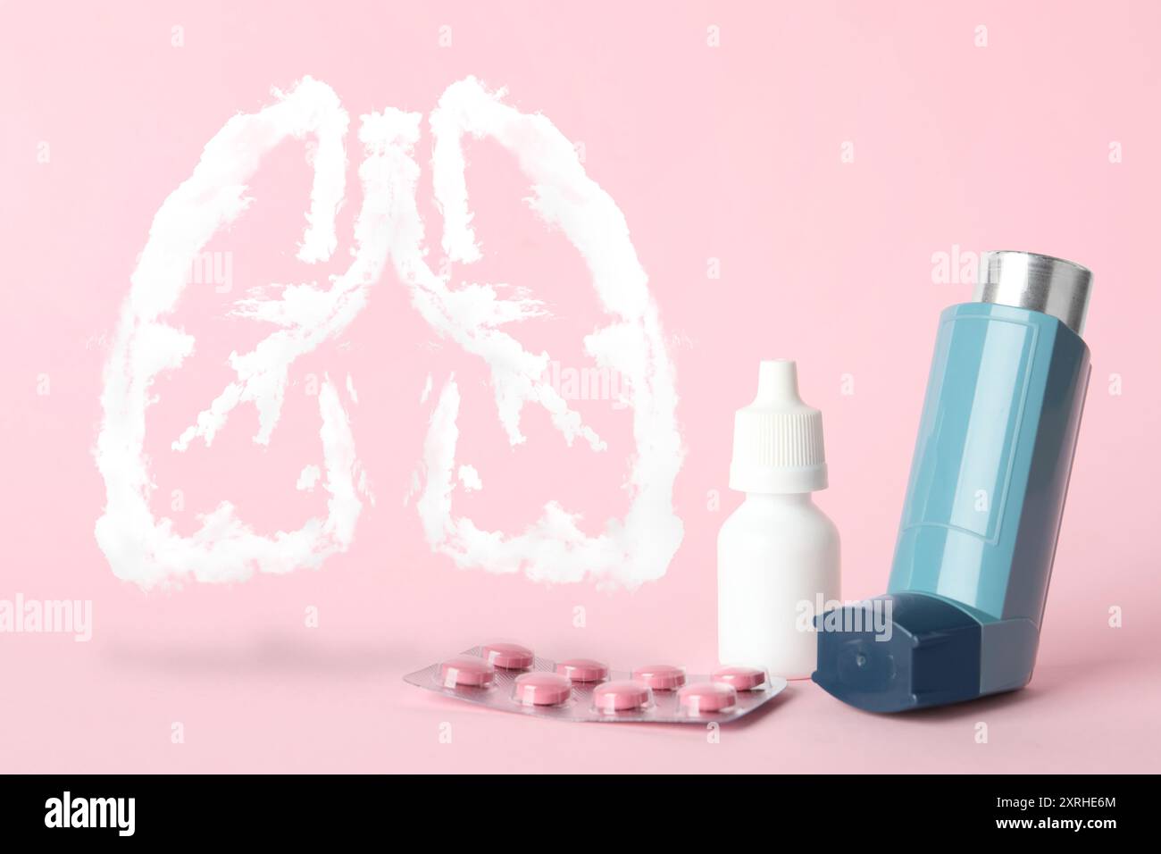 Asthma inhaler, drugs and illustration of lungs on pink background ...
