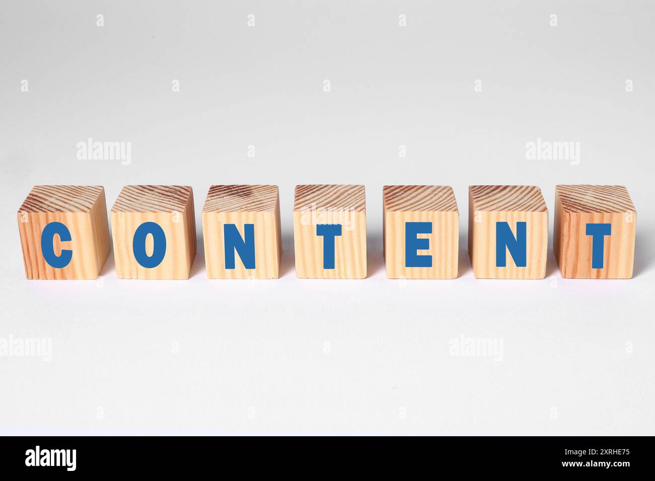 Wooden cube word content hi-res stock photography and images - Alamy