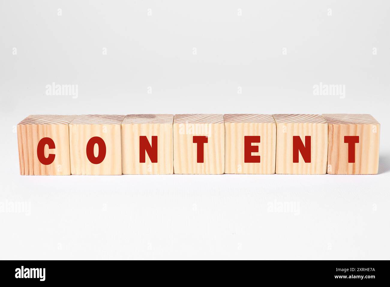 Wooden cube word content hi-res stock photography and images - Alamy
