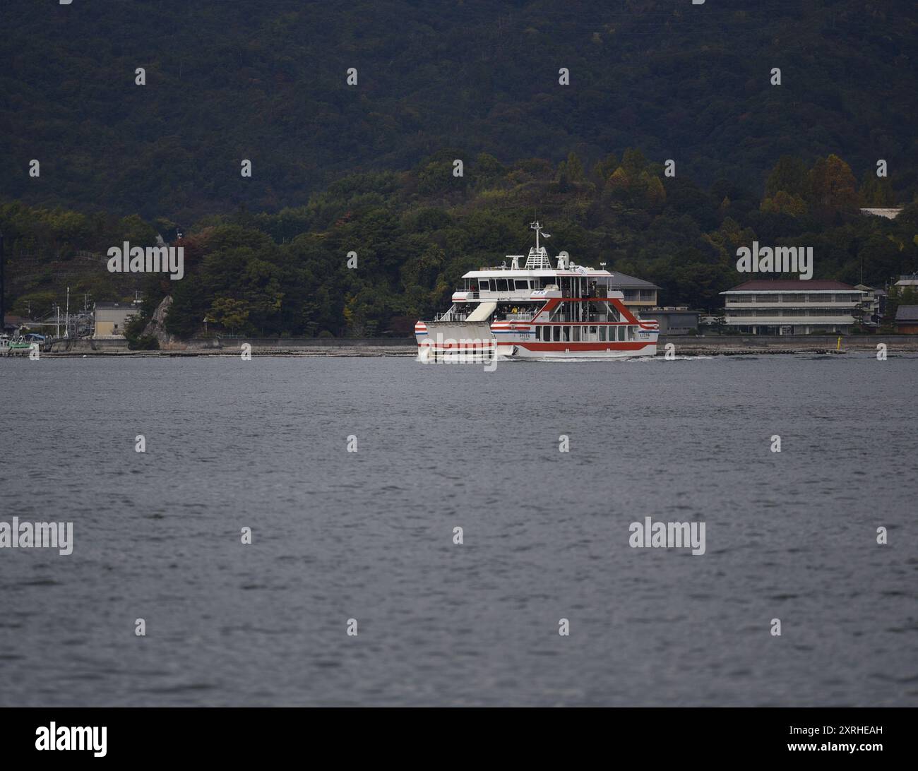 Landscape with scenic view of the JR West Miyajima Maru Ferry boat ...