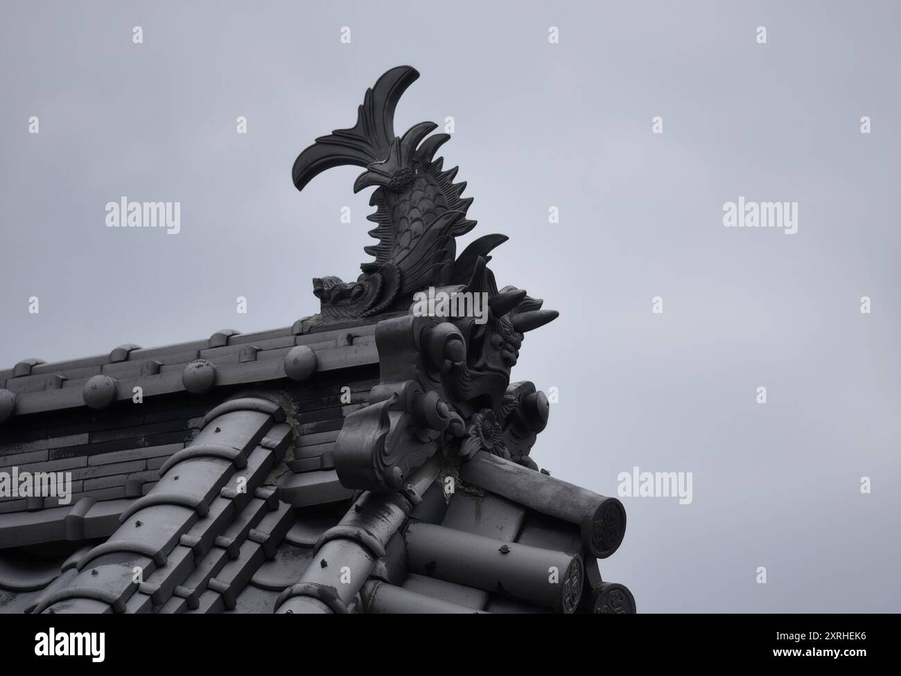 Traditional Japanese rooftop spiritual Onigawara ornamentation in ...