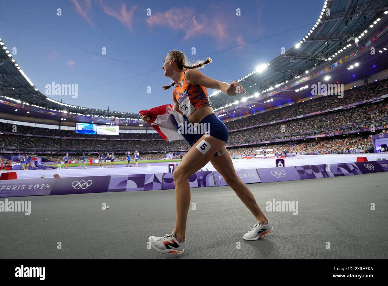 Femke Bol, of the Netherlands, celebrates after winning the silver ...
