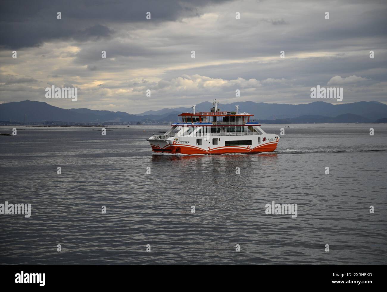 Landscape with scenic view of the JR West Miyajima Maru Ferry boat ...