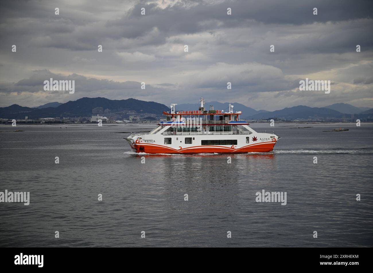 Landscape with scenic view of the JR West Miyajima Maru Ferry boat ...