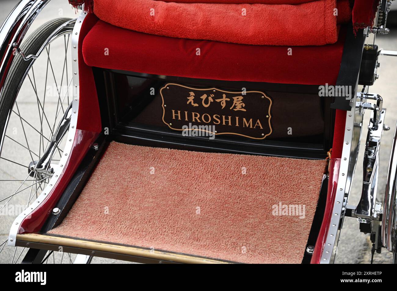 Traditional rickshaw carriage seat and wheels in Miyajima island, Japan ...