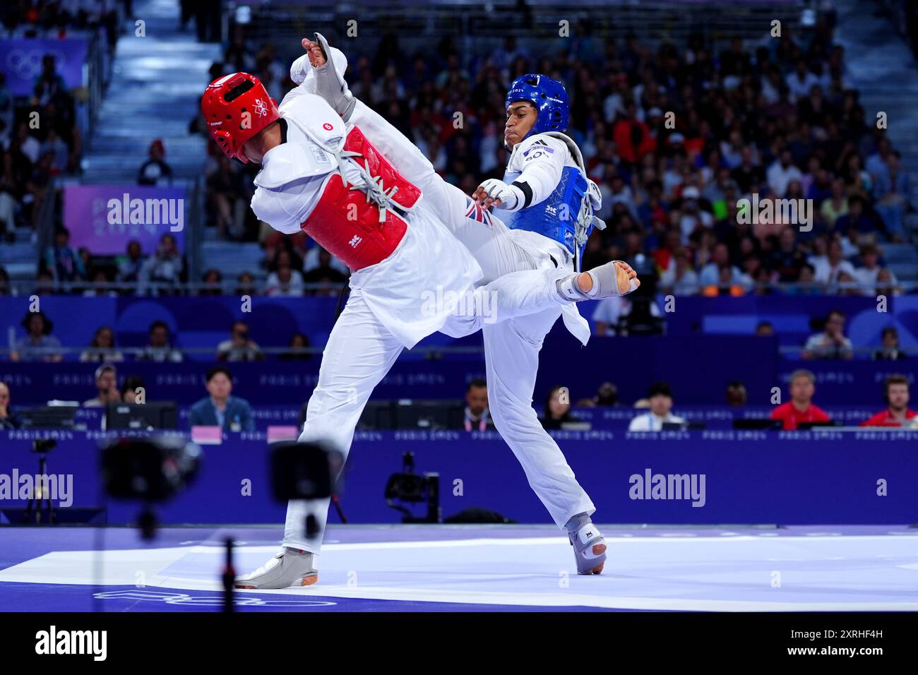 Great Britain's Caden Cunningham (right) and Iran's Arian Salimi during ...