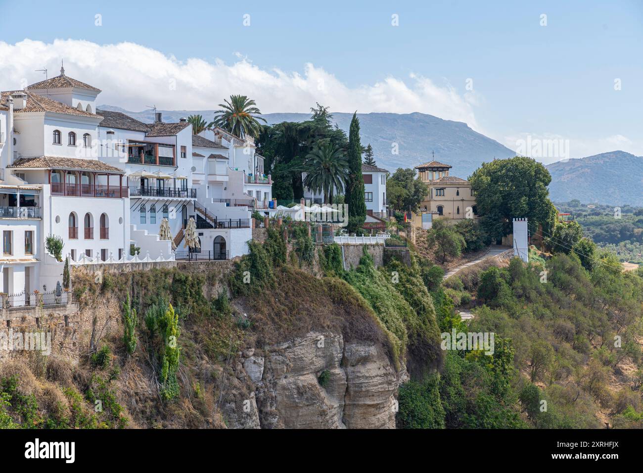 A stunning view of whitewashed houses perched on the edge of the Tajo ...