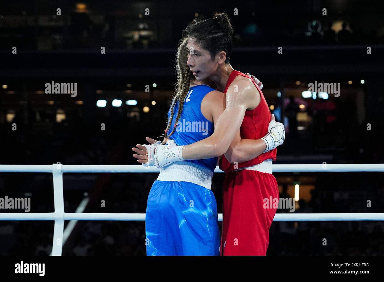 Taiwan's Lin Yu-ting embraces Poland's Julia Szeremeta after Lin won in ...