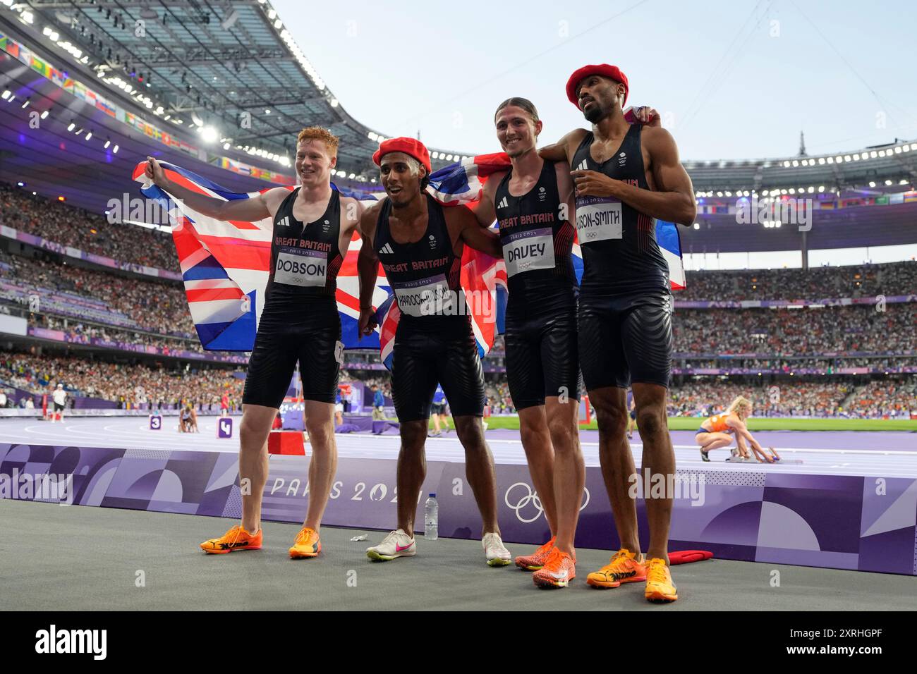 Team Britain poses after winning the bronze medal in the men's 4 x 400 ...