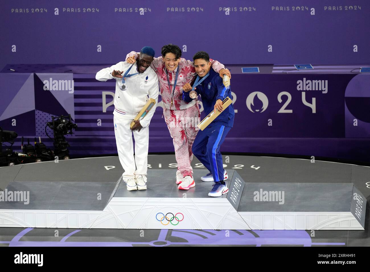 Gold medallist Canada's Philip Kim, known as B-Boy Phil Wizard, center ...