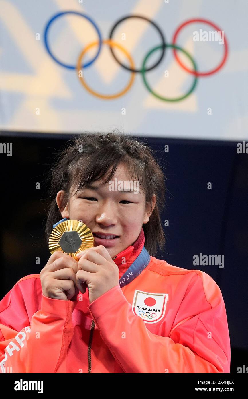 Gold medalist Japan's Sakura Motoki poses for photographers during the ...