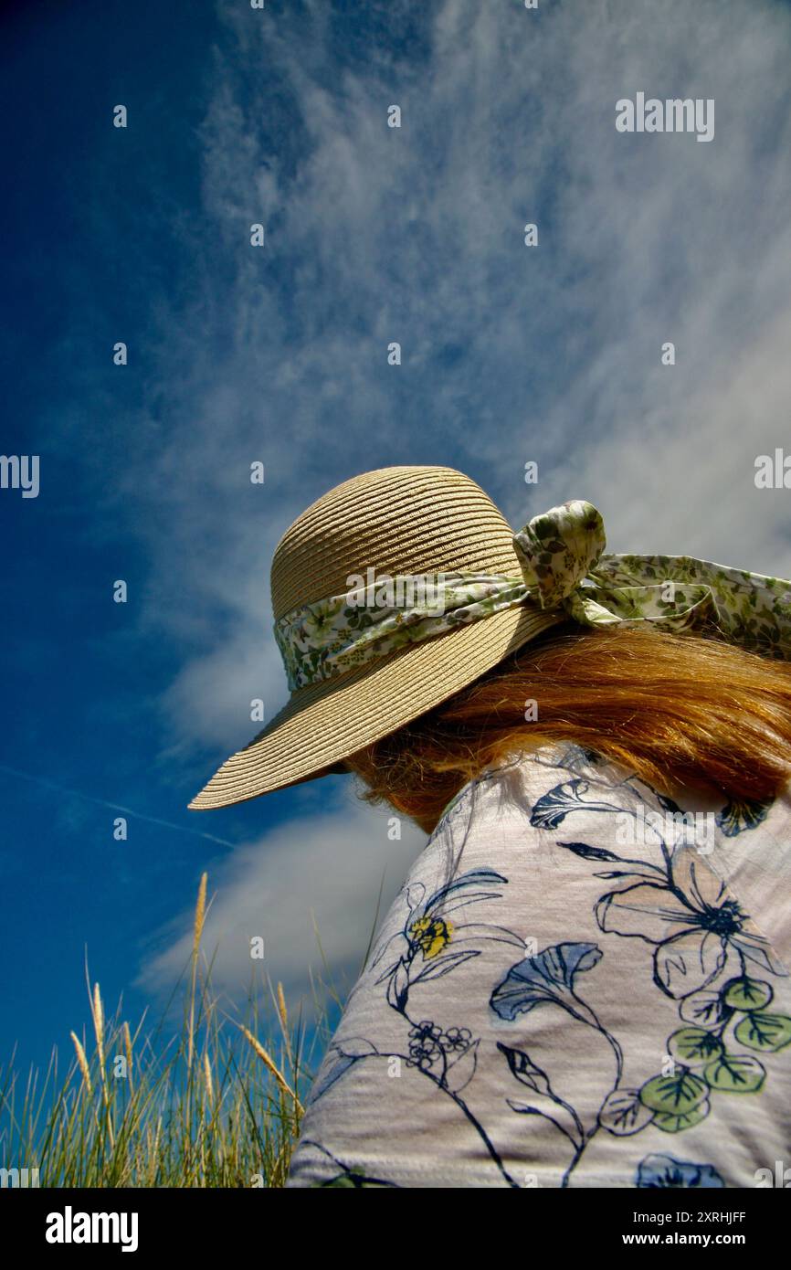 A lady with red hair, under the summer sun Stock Photo - Alamy