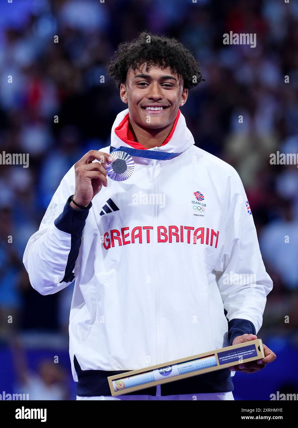 Britain's Caden Cunningham celebrates with his silver medal during the ...