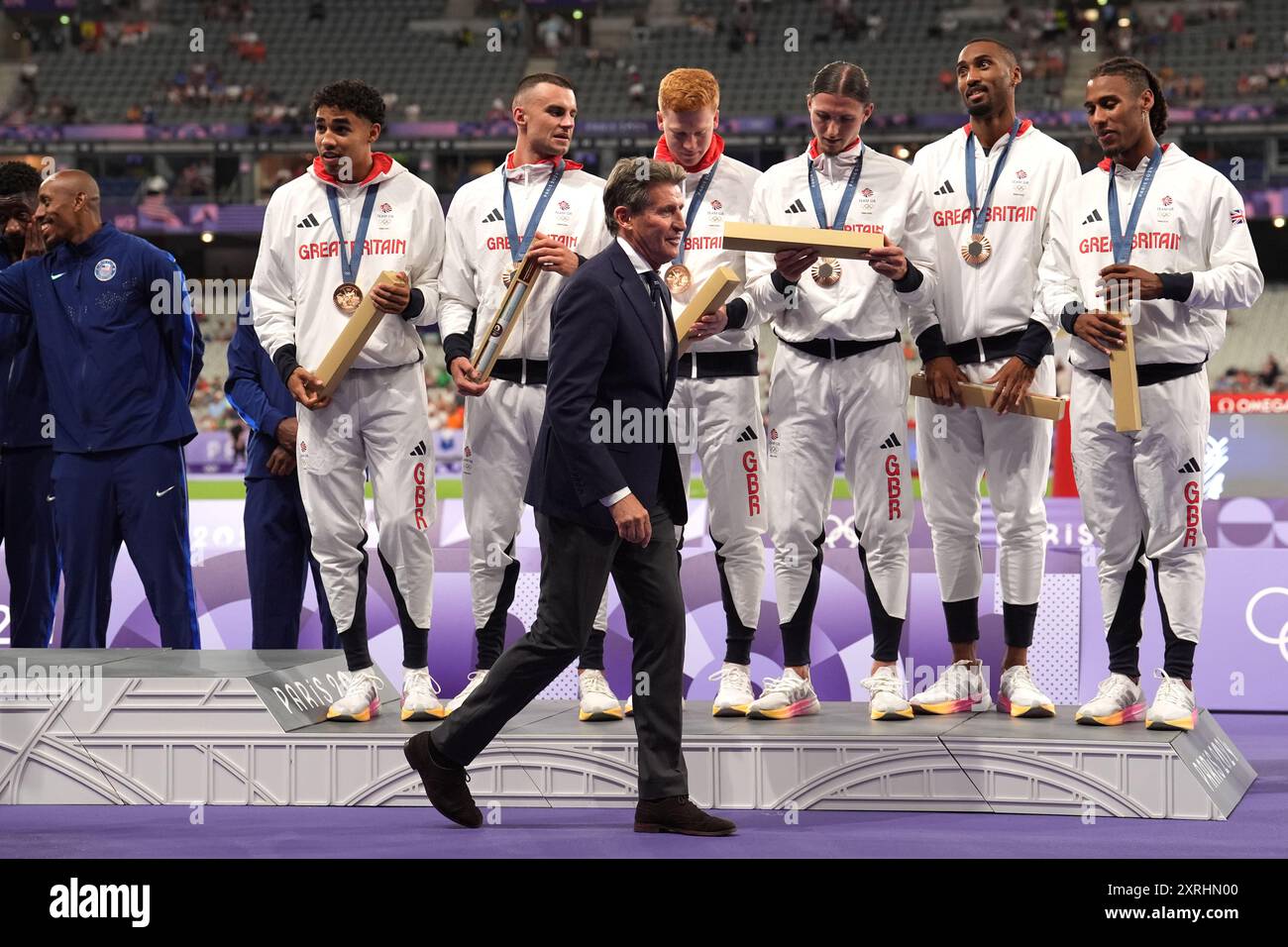 World Athletics president Lord Sebastian Coe presents the bronze medal ...