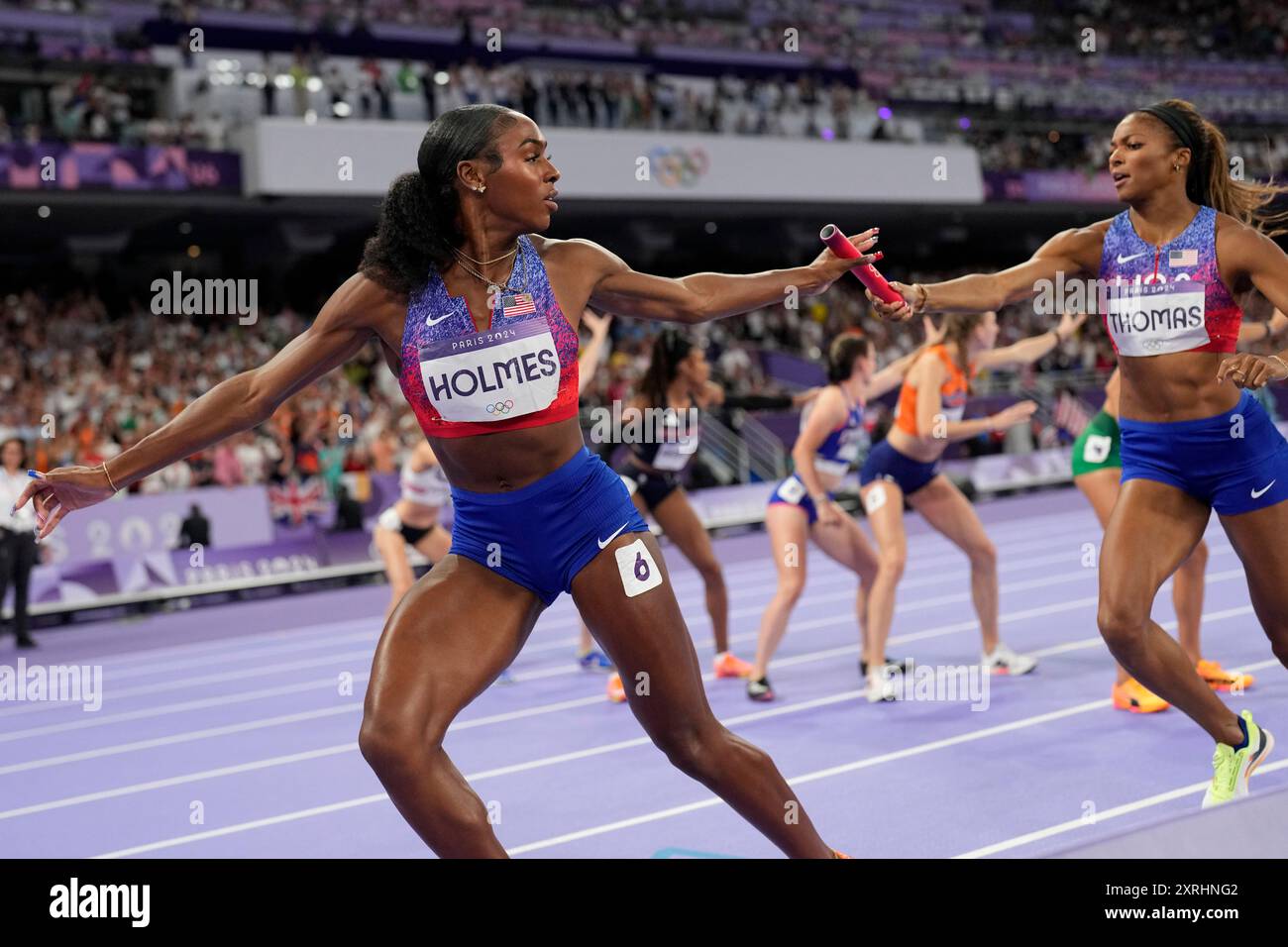 Gabrielle Thomas, of the United States, hands off to teammate Alexis ...