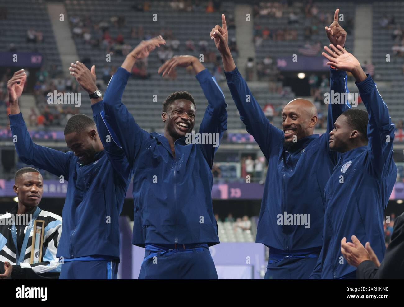 Paris, France. 10th Aug, 2024. Men's 4 X 400m relay gold medalists Team USA celebrate on the ...