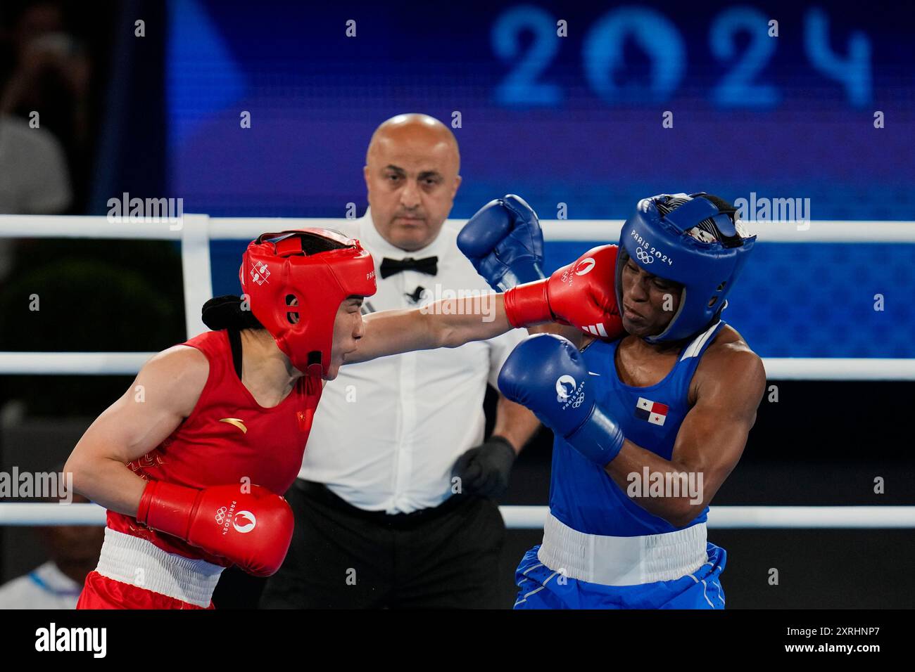 China's Li Qian, left, fights Panama's Atheyna Bylon in their women's ...