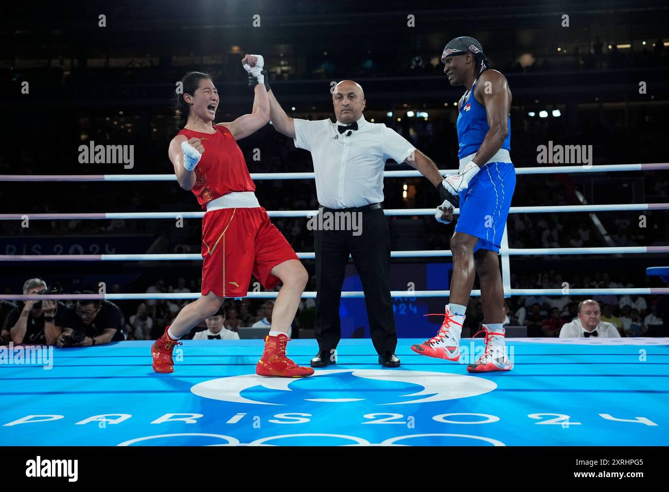 China's Li Qian celebrates after defeating Panama's Atheyna Bylon in ...