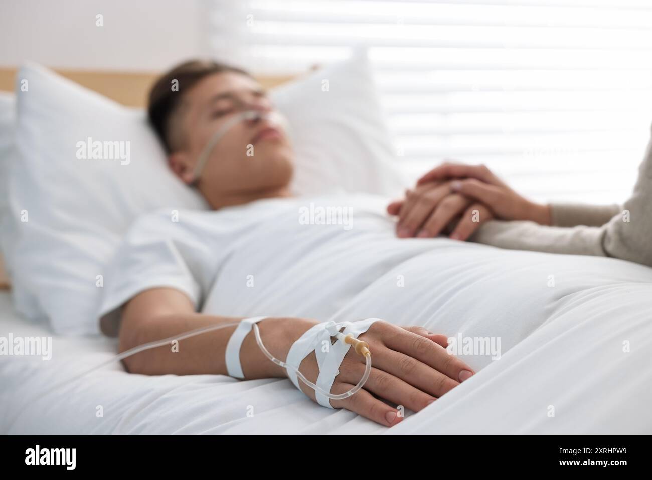 Woman in coma hospital hi-res stock photography and images - Alamy