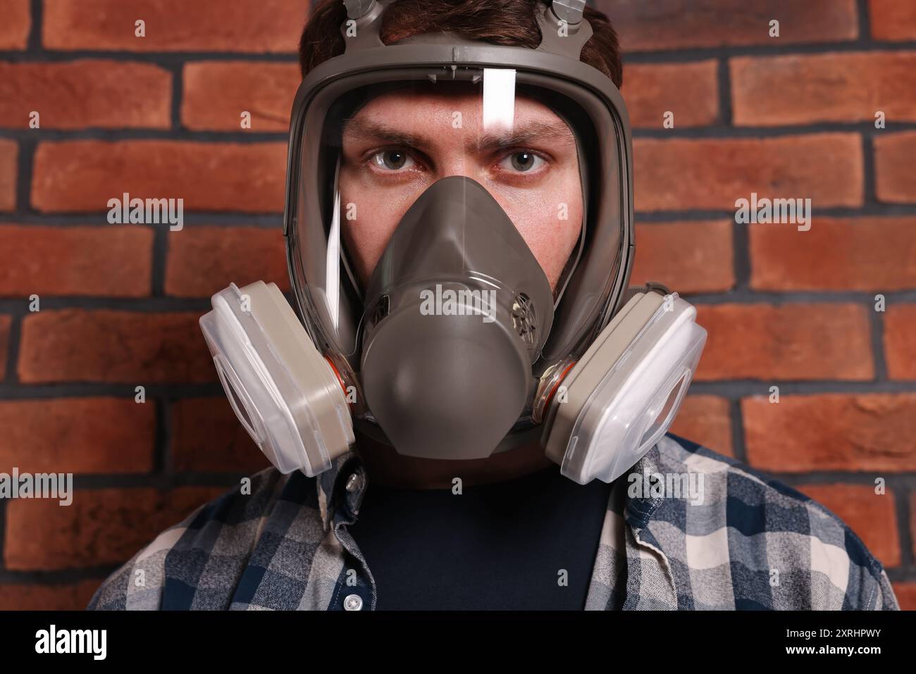 Man in work wear red hi-res stock photography and images - Alamy