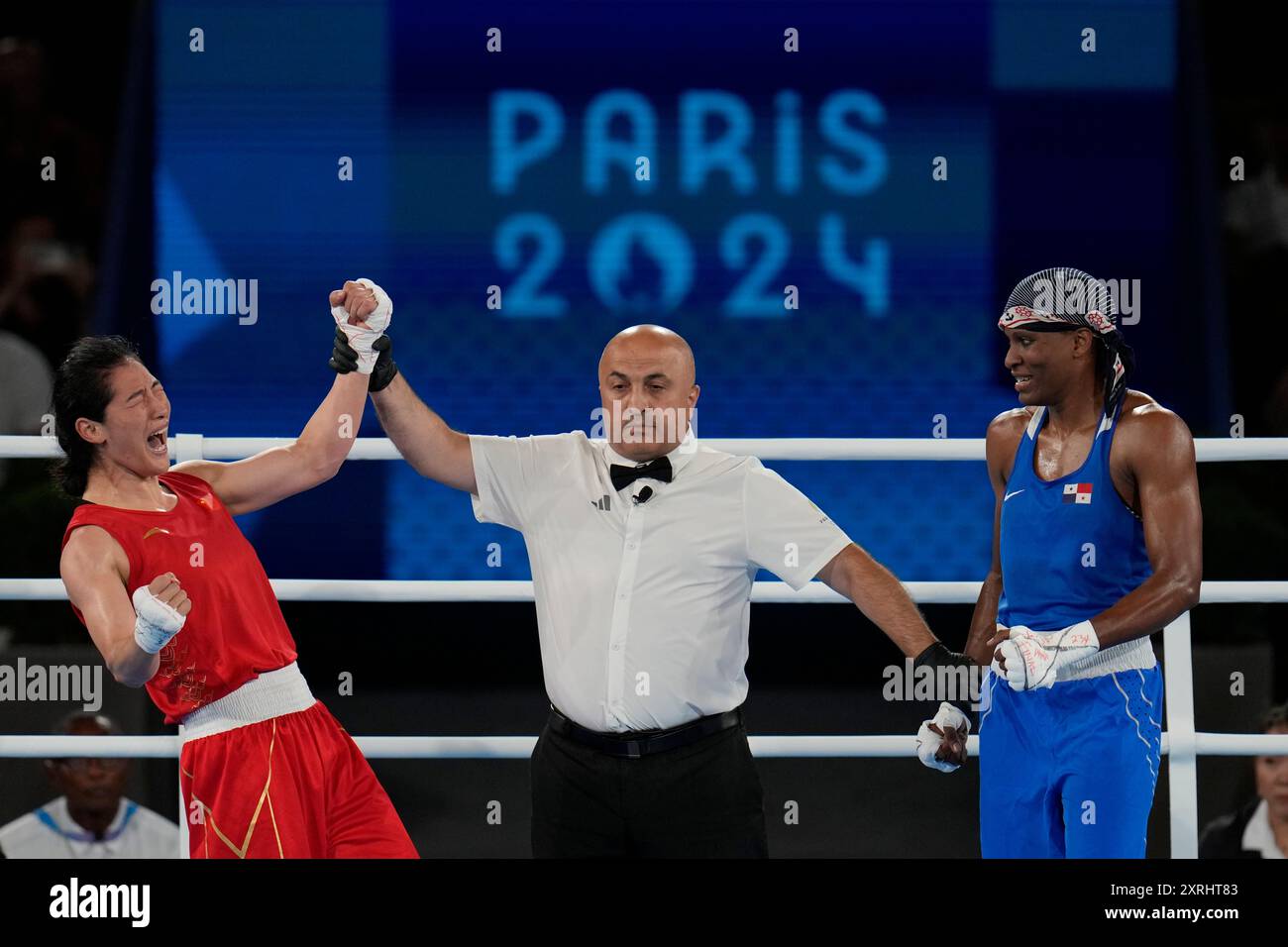 China's Li Qian celebrates after defeating Panama's Atheyna Bylon in ...