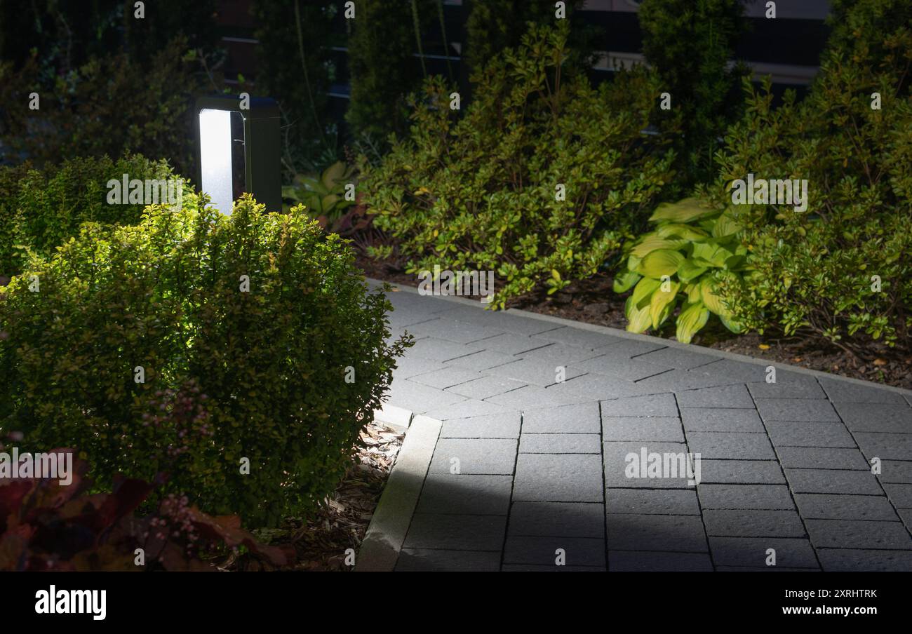 Peaceful nighttime garden path illuminated hi-res stock photography and ...