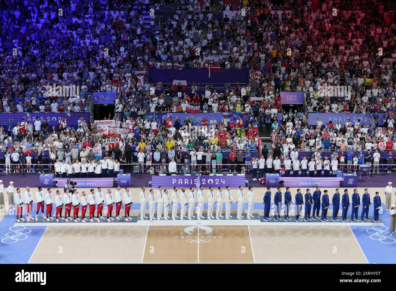 Paris, France. 10th Aug, 2024. Gold medalists team France (C), silver medalists team Poland (L ...