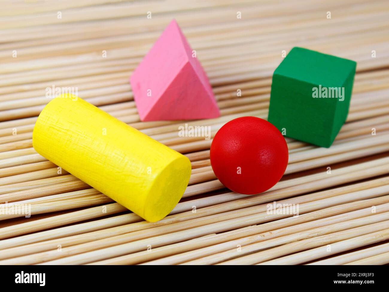 Colorful wooden geometric figures Stock Photo - Alamy
