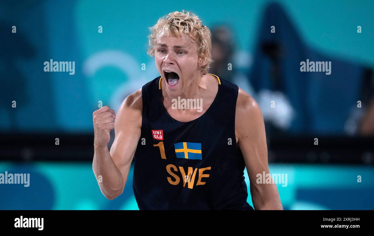 Sweden's David Ahman celebrates winning a point during the beach ...