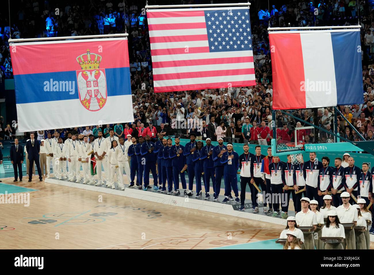 The United States men's basketball team celebrates after winning the ...