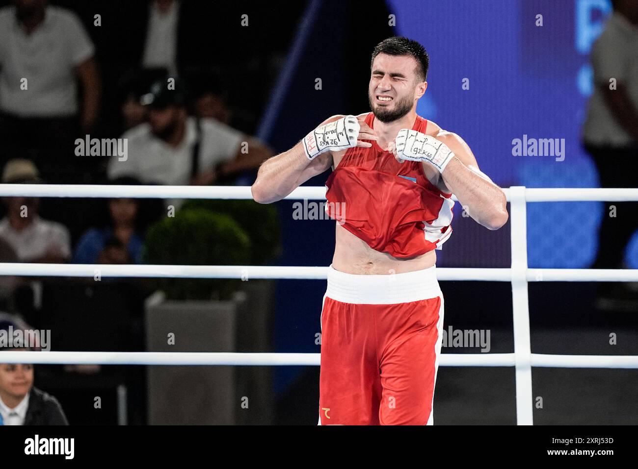 Bakhodir Jalolov of Uzbekistan celebrate the gold medal during Men's ...