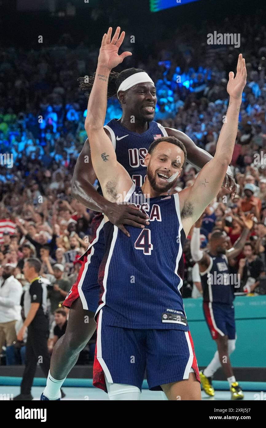 Jrue Holiday (12) and Stephen Curry (4) celebrate after team USA ...