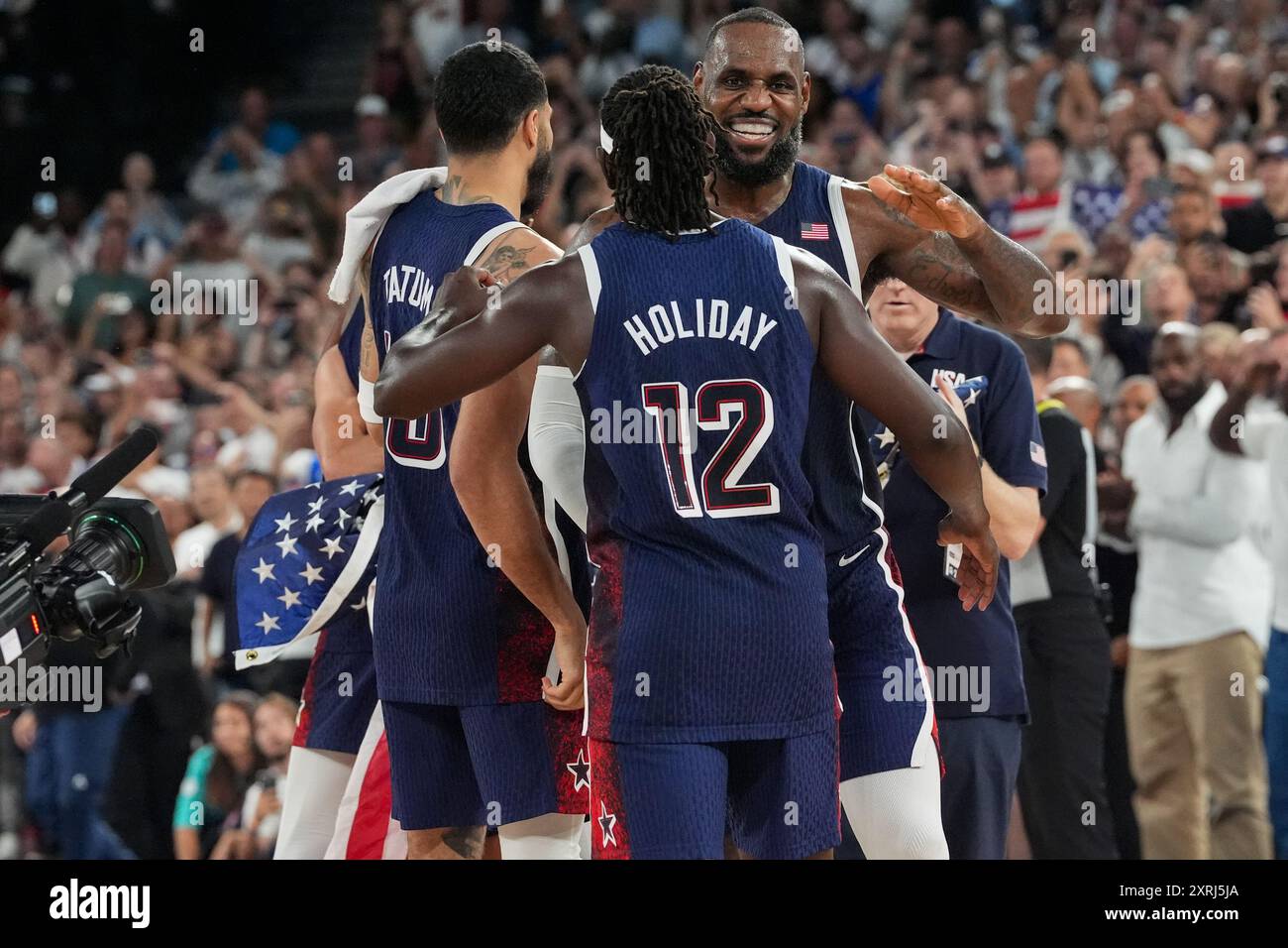 Jrue Holiday (12) and LeBron James (6) celebrate after team USA ...